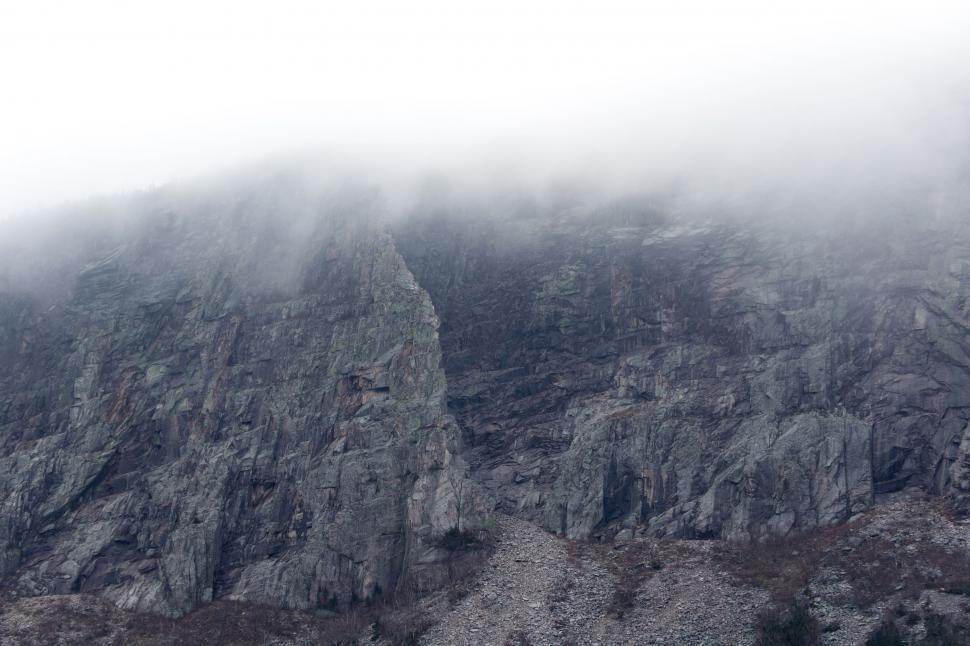 Free Stock Photo of Misty mountain rock face engulfed in fog | Download ...