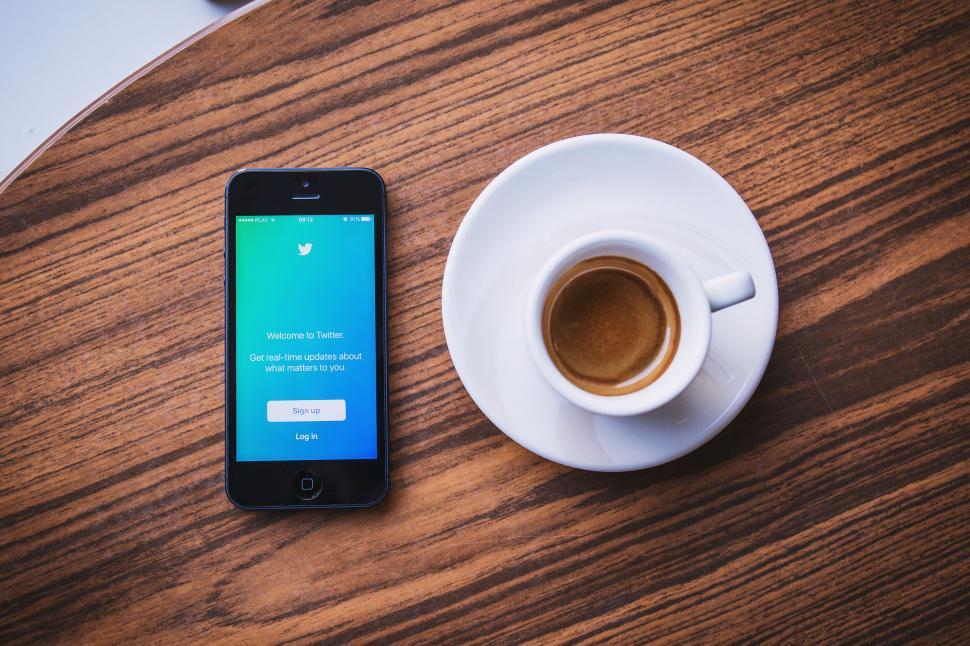 Free Stock Photo of Coffee cup and phone displaying Twitter app ...