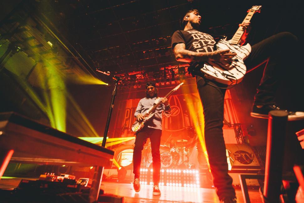 Free Stock Photo of Guitarist performing on a concert stage | Download ...
