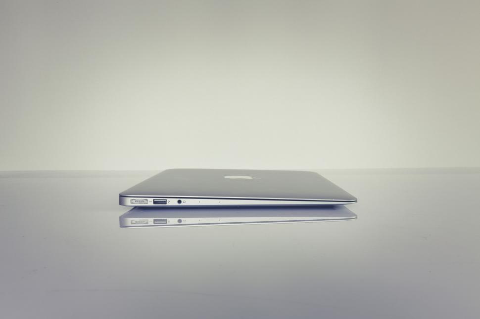 Free Stock Photo of Minimalist shot of a closed MacBook against ...