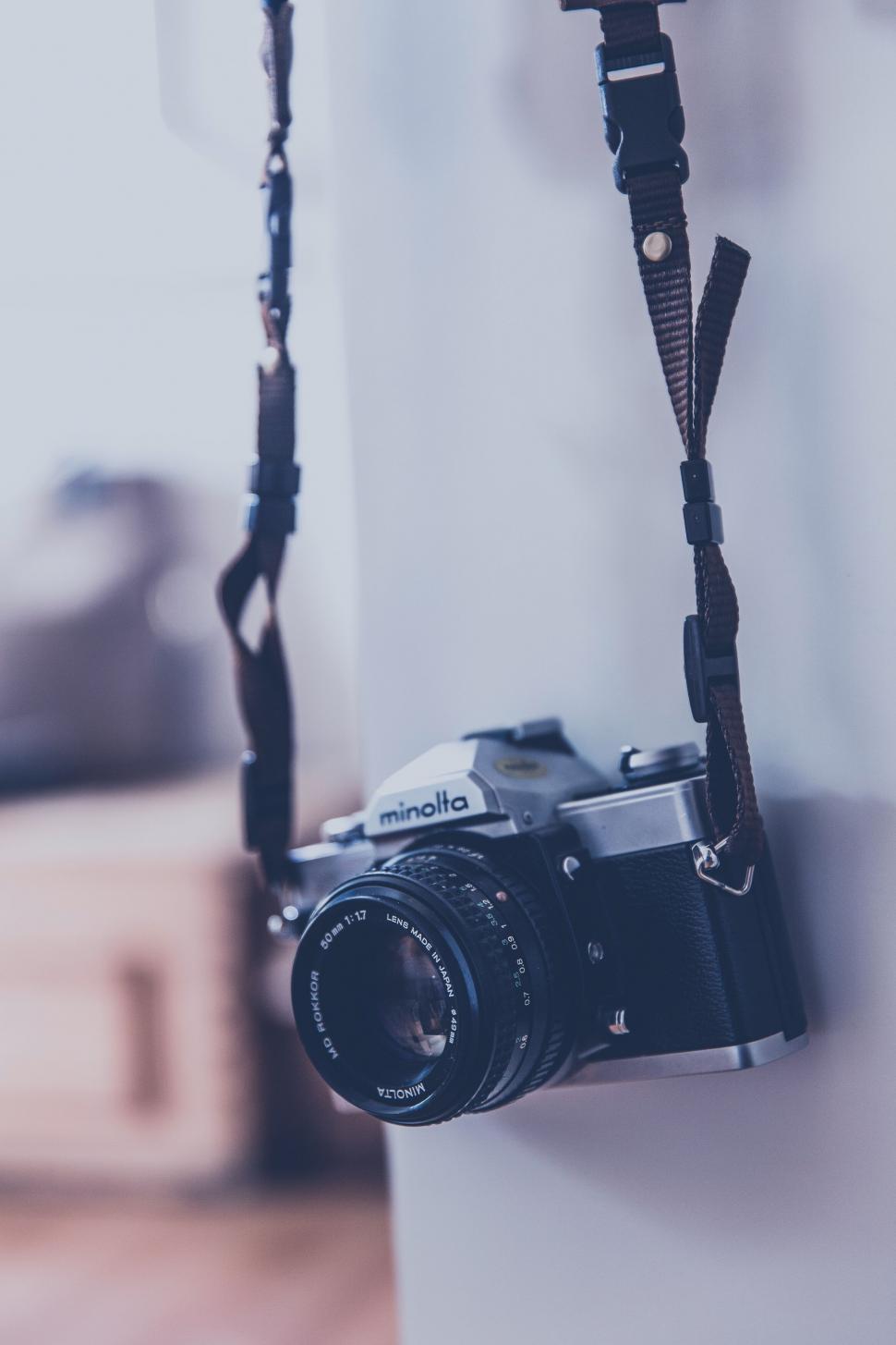 Free Stock Photo of Vintage Minolta camera hanging by its strap ...