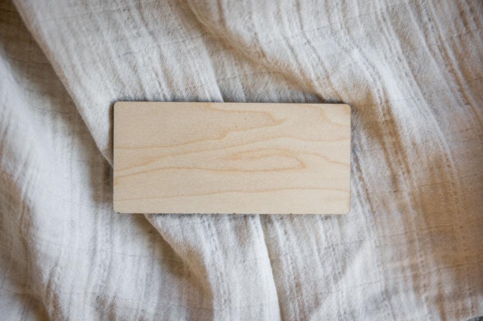 Free Stock Photo of Wooden block on textured linen fabric | Download ...