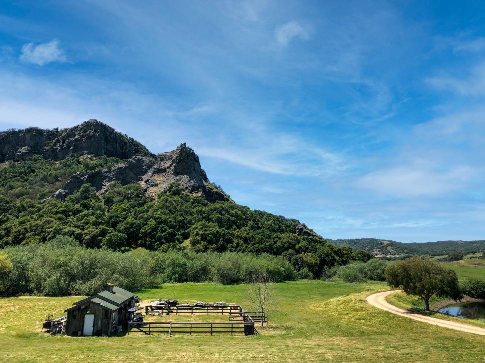Free Stock Photo of Rural landscape with a mountainside and shack ...