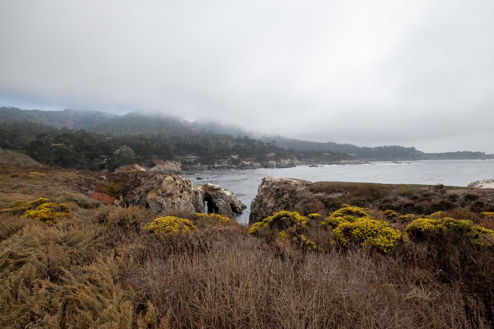 Free Stock Photo of Coastal view with fog over rough terrain and sea ...
