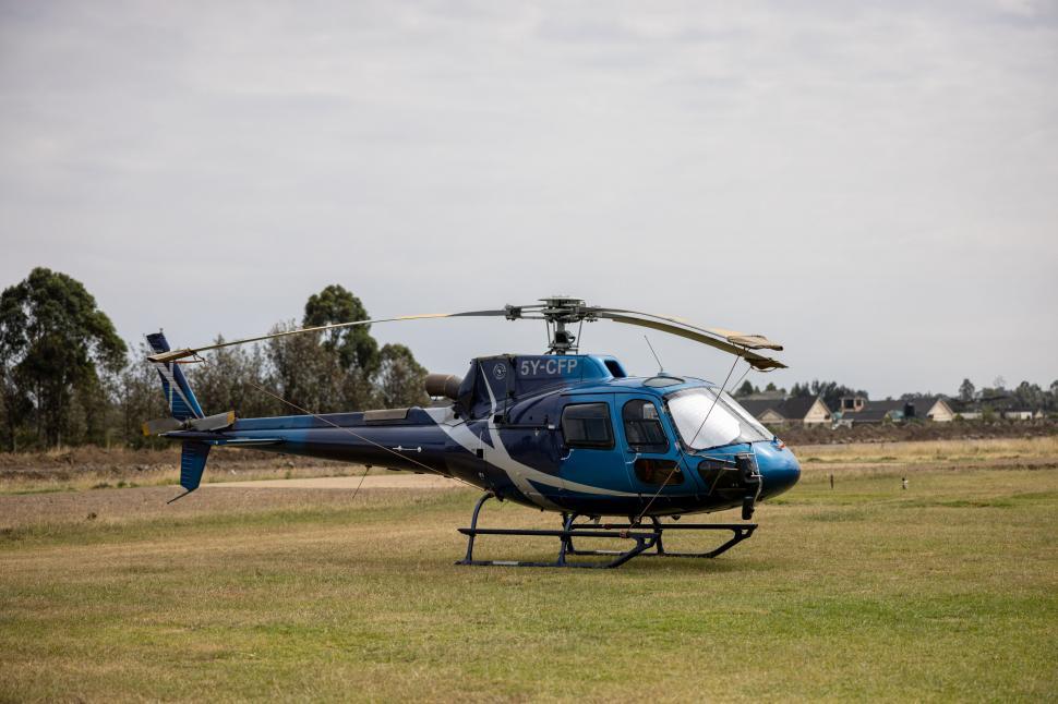 Free Stock Photo of Blue helicopter parked on grass field | Download ...