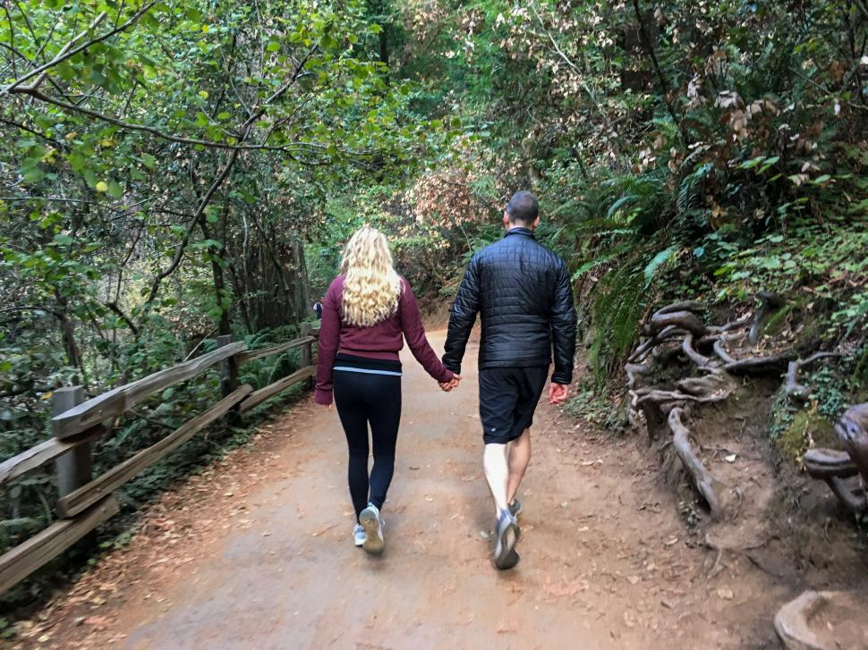 Free Stock Photo of Couple walking hand in hand on trail | Download ...
