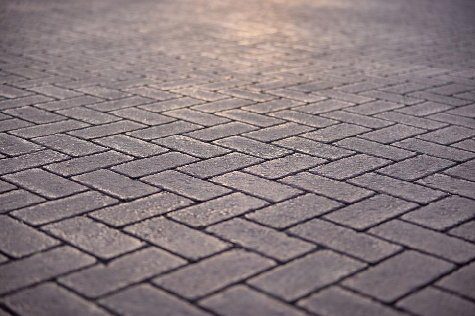 Free Stock Photo of Golden hour glow on textured paving stones ...