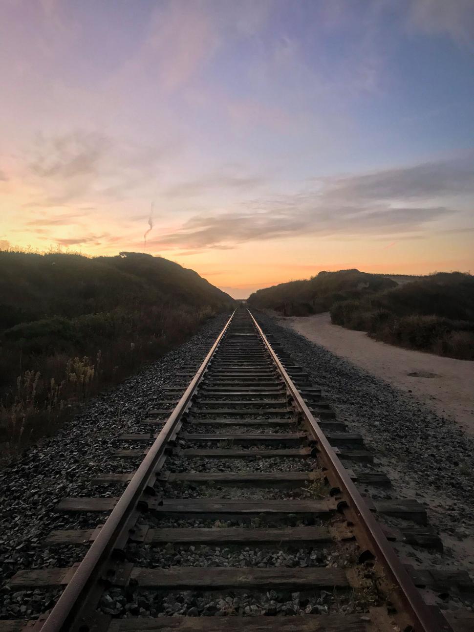 Free Stock Photo of Railroad tracks leading into the distance ...