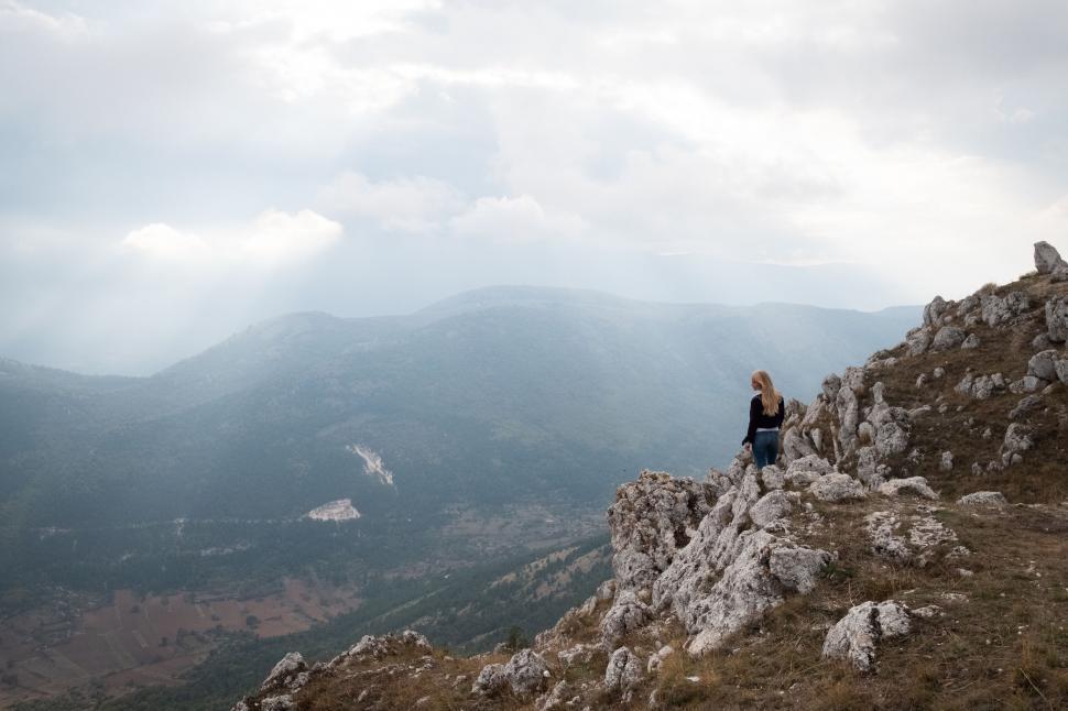 Free Stock Photo of Woman contemplating nature on a cliff | Download ...
