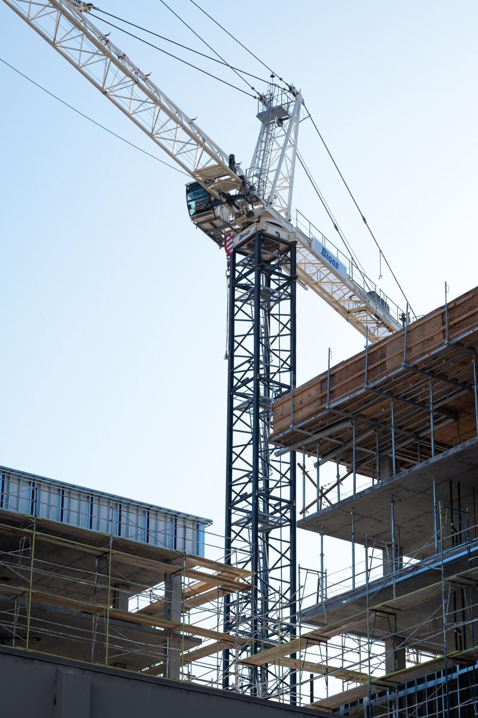Free Stock Photo of Construction crane at a modern building site ...