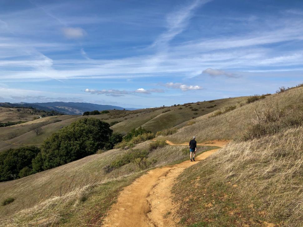 Free Stock Photo of Hiker on a trail in rolling hills | Download Free ...