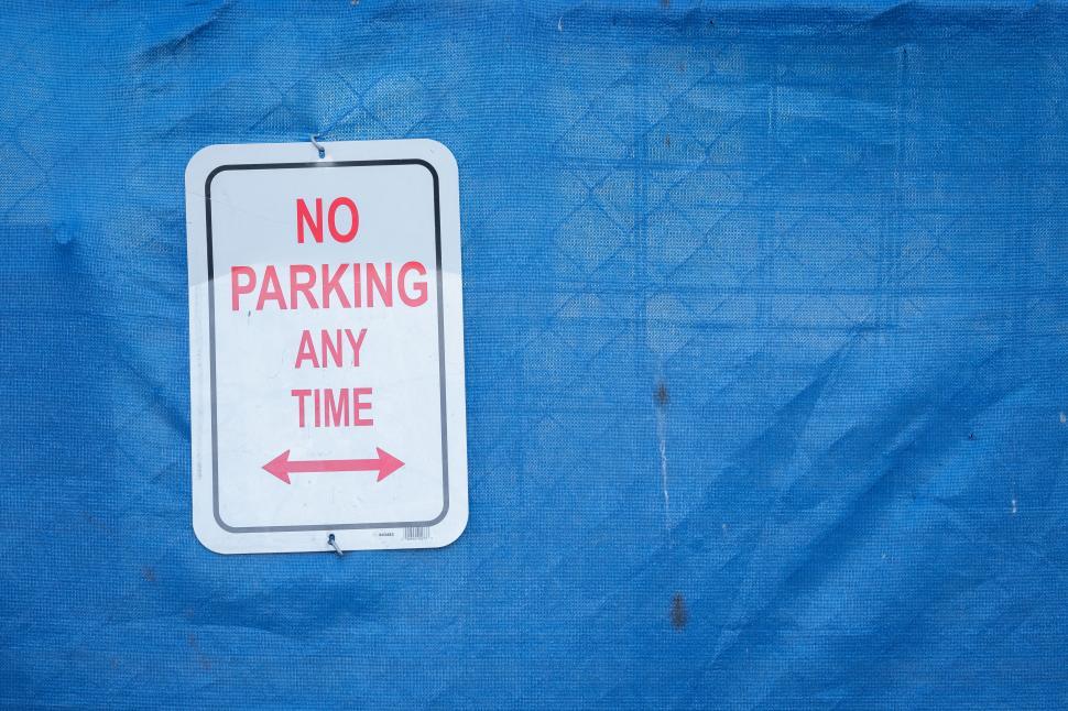 Free Stock Photo of No parking traffic sign on blue tarp background ...