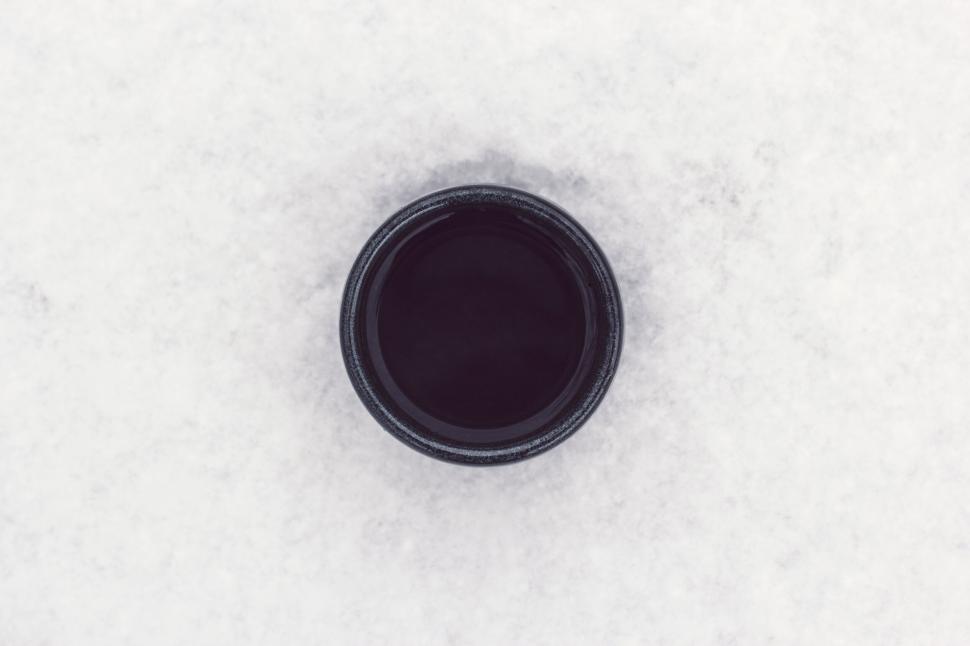 Free Stock Photo of Black camera lens cap on white snow | Download Free ...
