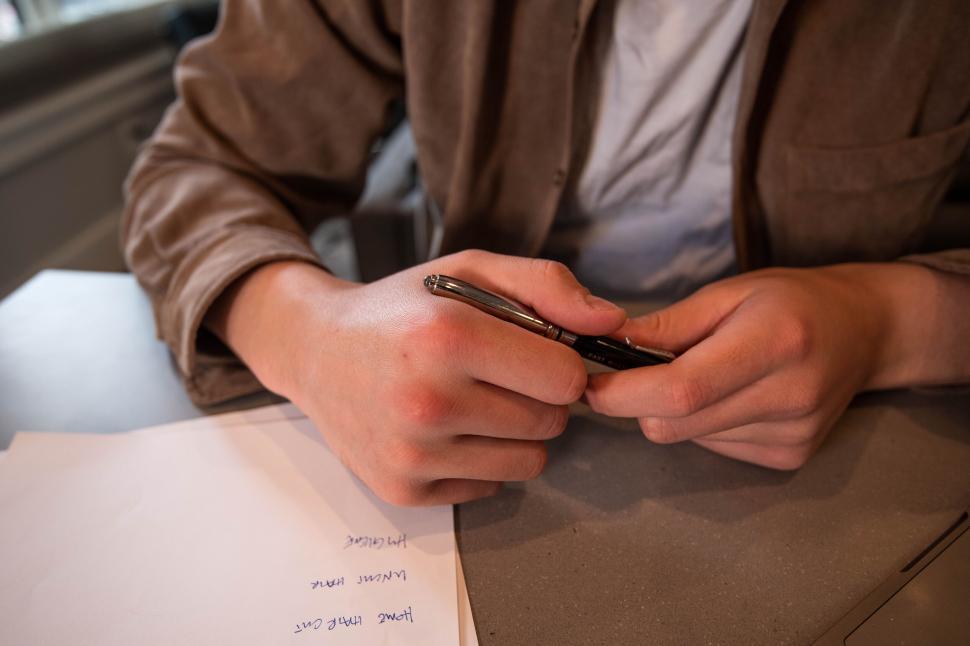 Free Stock Photo of Close-up of hands writing with a pen on paper ...