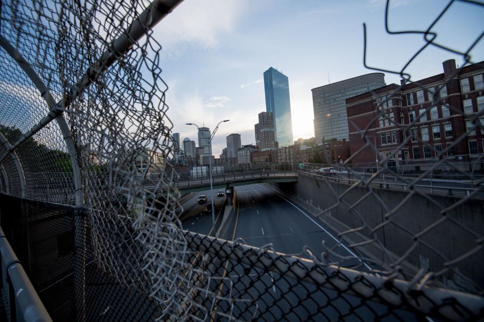 Free Stock Photo of City view through a fence at twilight | Download ...