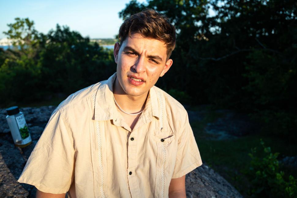 Free Stock Photo of Man grimacing in harsh sunlight with nature ...