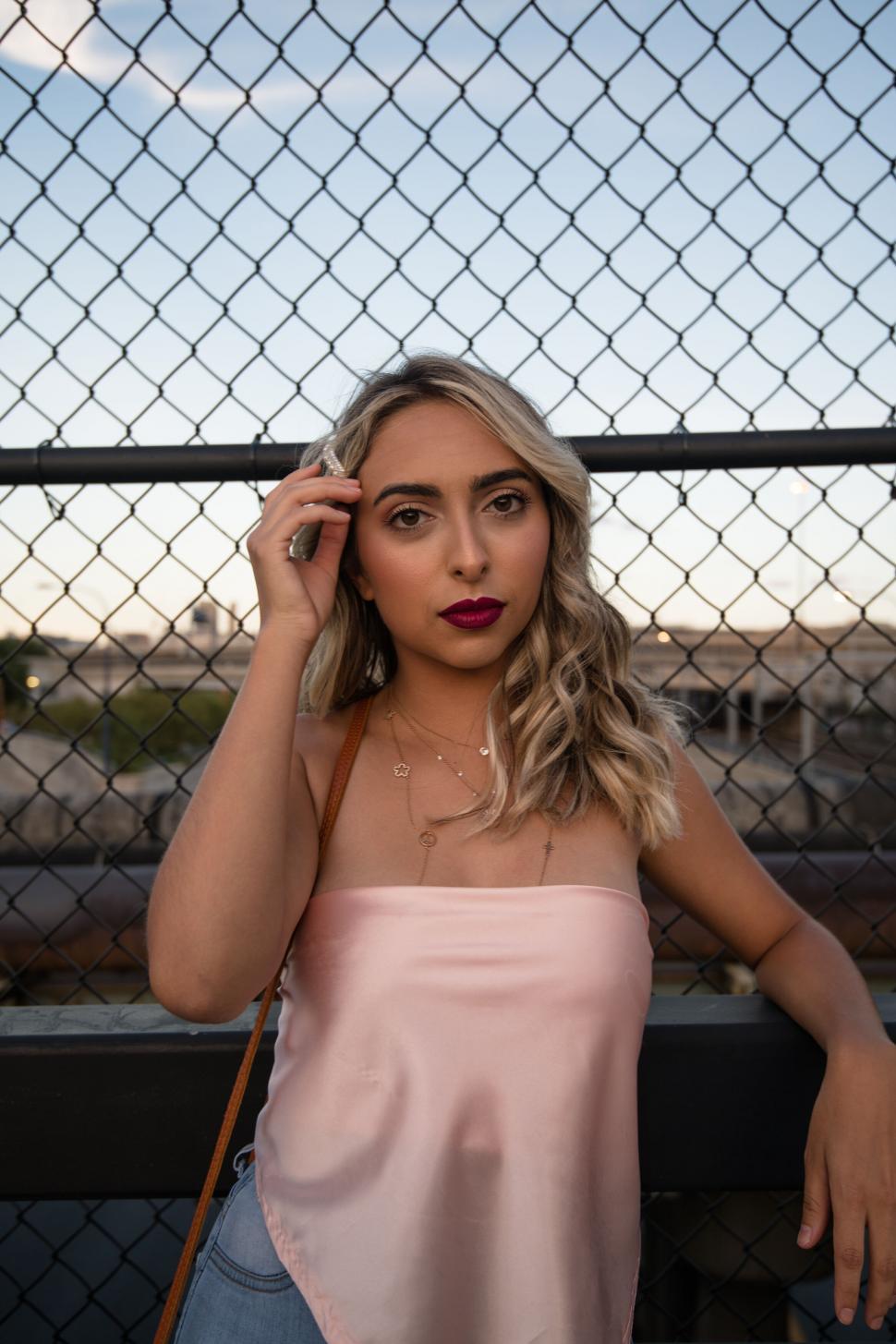 Free Stock Photo of Woman with dramatic backdrop in urban setting ...