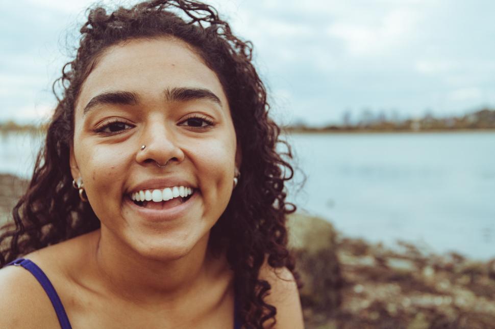 Free Stock Photo of Warm smile on waterside woman s face | Download ...
