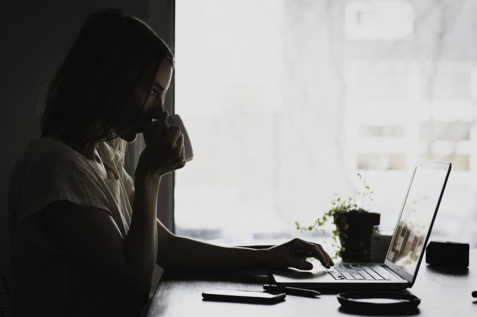 Free Stock Photo of Unrecognizable person sitting at a laptop ...