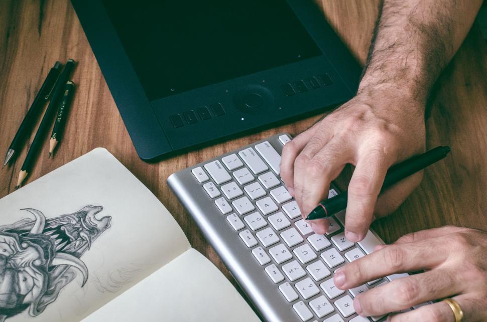 Free Stock Photo of Artist s hands on keyboard with a drawing tablet ...