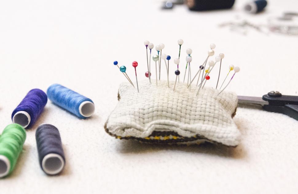 Free Stock Photo of Sewing needles on a pincushion with threads ...