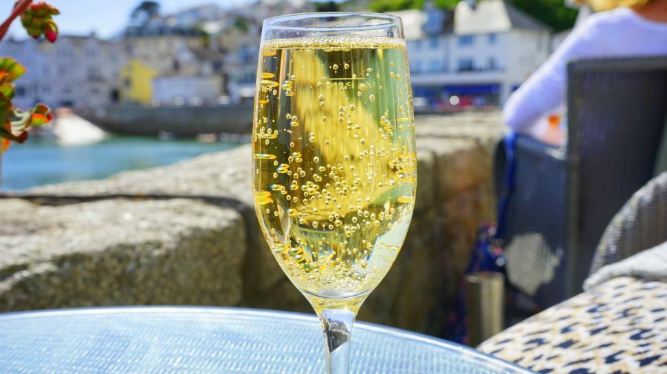 Free Stock Photo of Glass of sparkling wine with seaside background ...