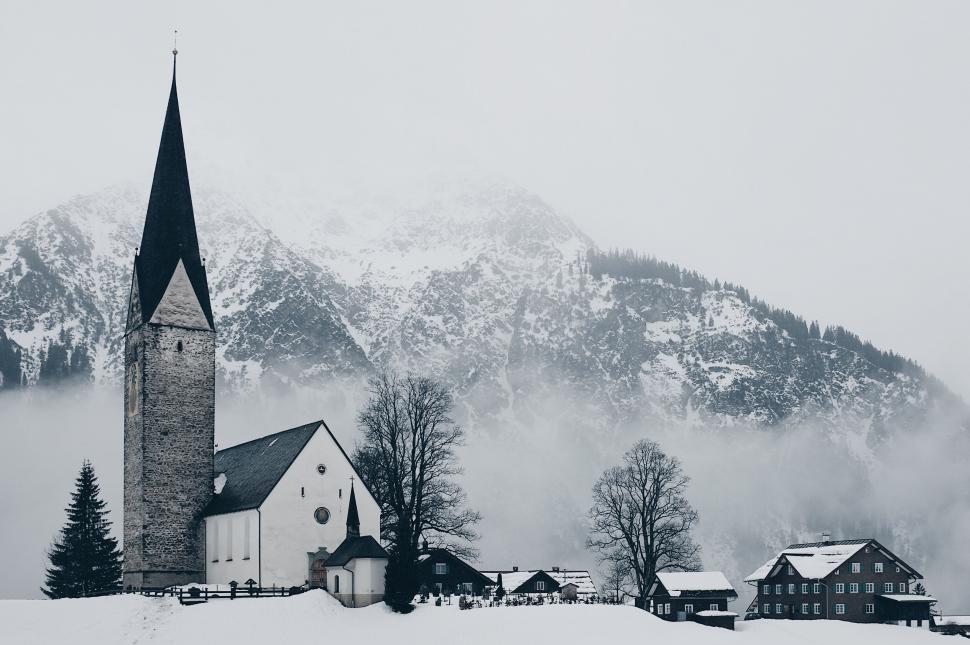 Free Stock Photo of Snowy church and mountain in a small village ...