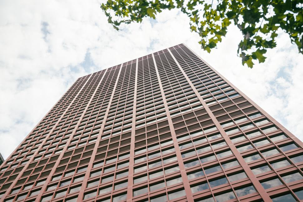 Free Stock Photo of Towering red skyscraper reaching into the sky ...