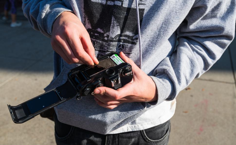 Free Stock Photo of Close-up of hands loading film into camera ...