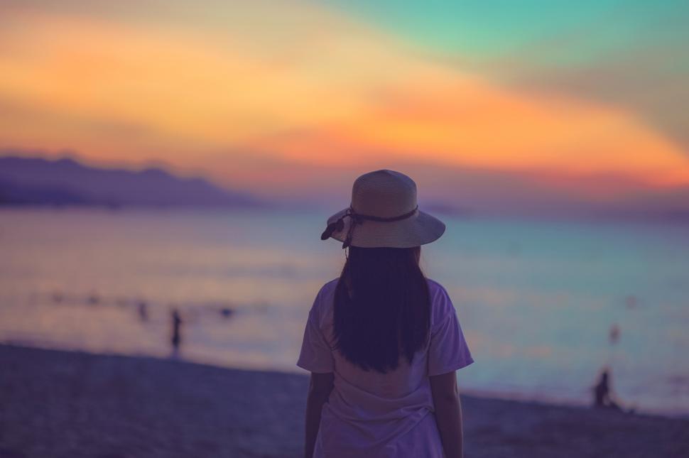 Free Stock Photo of Woman watching sunset on the beach | Download Free ...