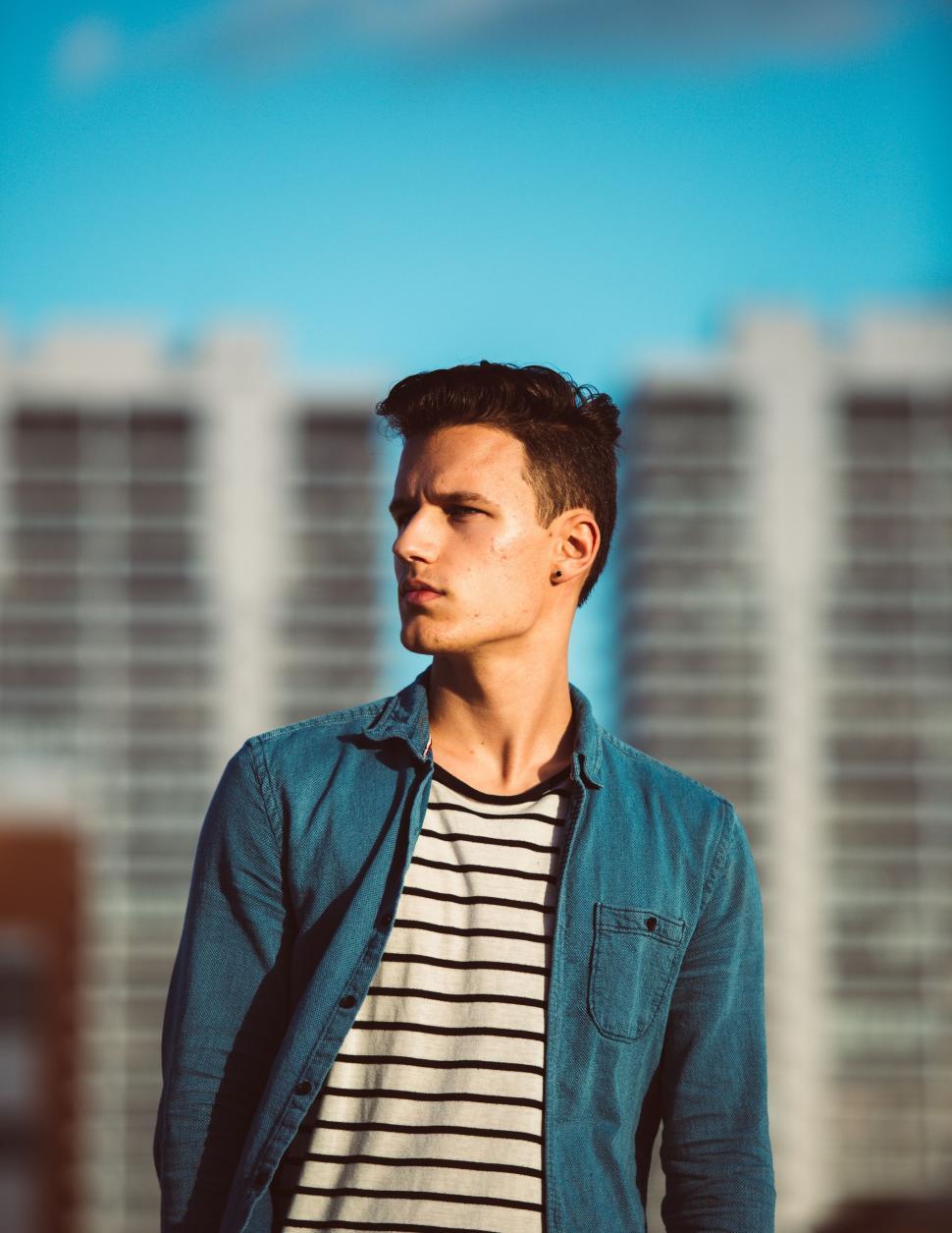 Free Stock Photo of Young man in contemplative urban scene | Download ...