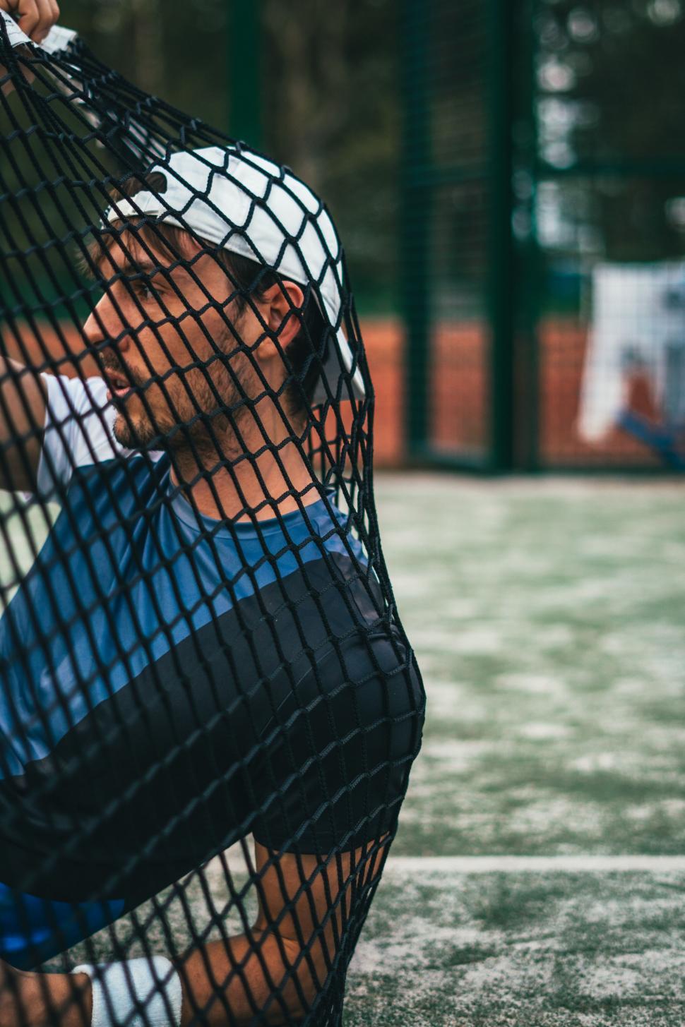 Free Stock Photo of Man resting behind a soccer goal net | Download ...