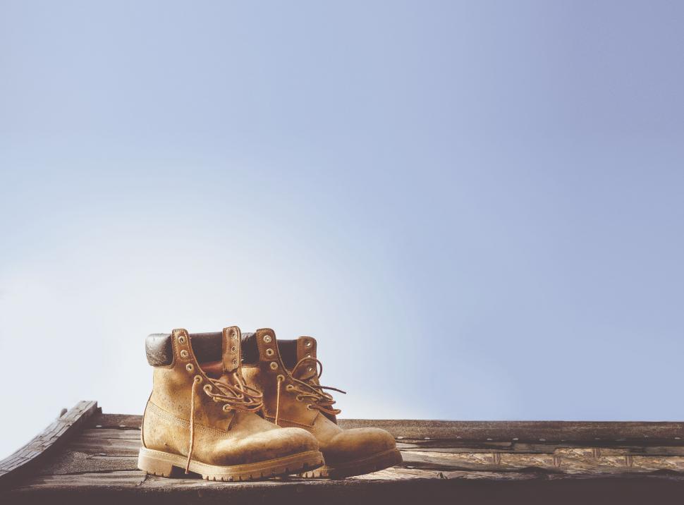 Free Stock Photo of Pair of work boots against a sky background ...