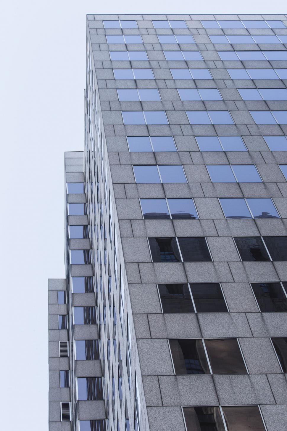 Free Stock Photo of Skyscraper with a geometric facade against the sky ...