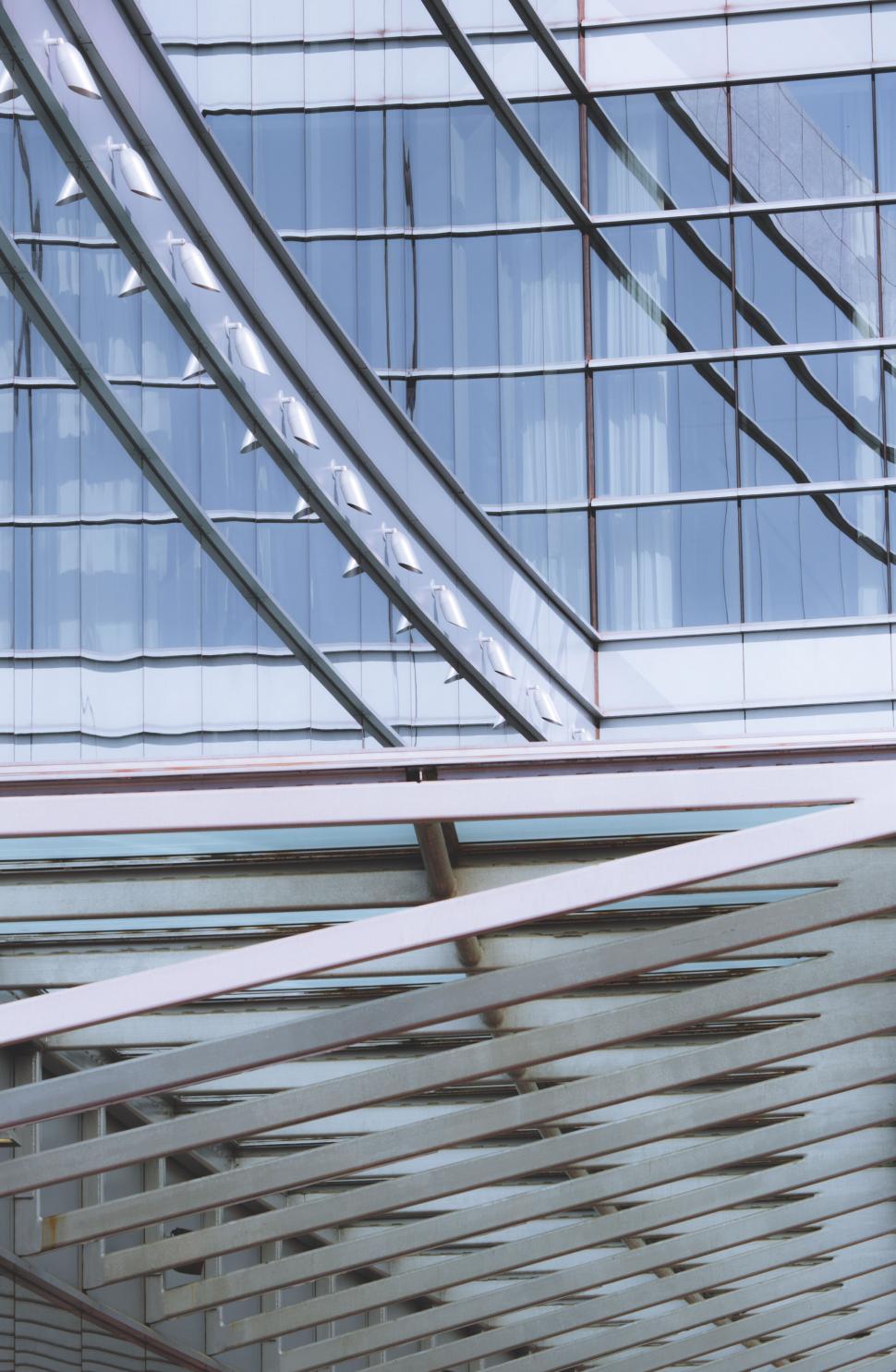 Free Stock Photo of Reflection on a glass building with steel beams ...
