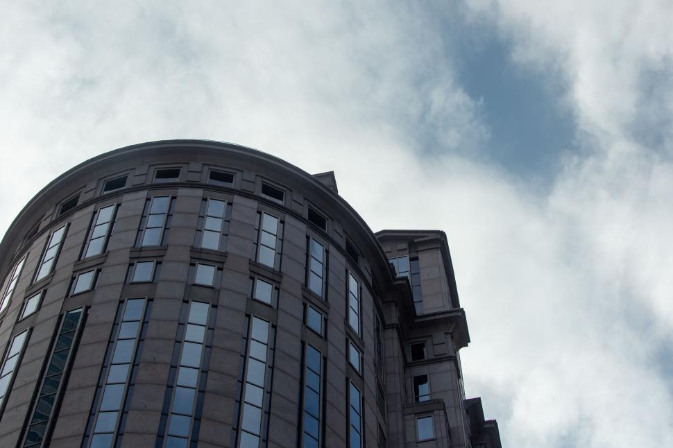 Free Stock Photo of Clouds over modern building with curved facade ...