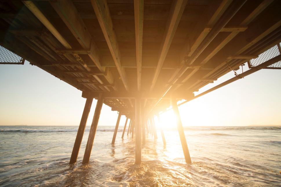 Free Stock Photo of Underneath a pier with waves during sunrise ...