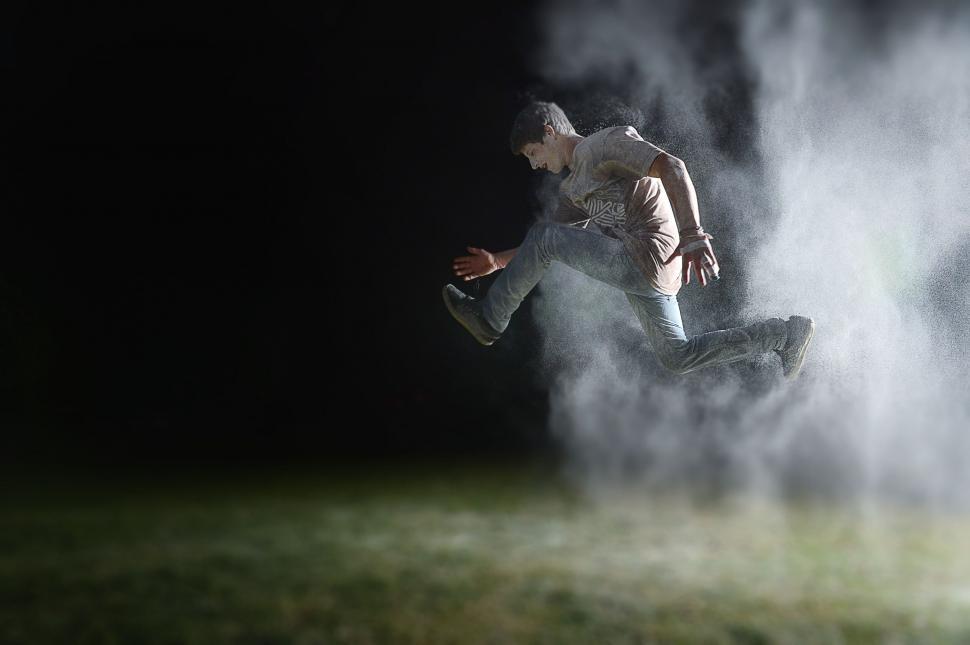 Free Stock Photo of Man jumping through foggy mist at night | Download ...