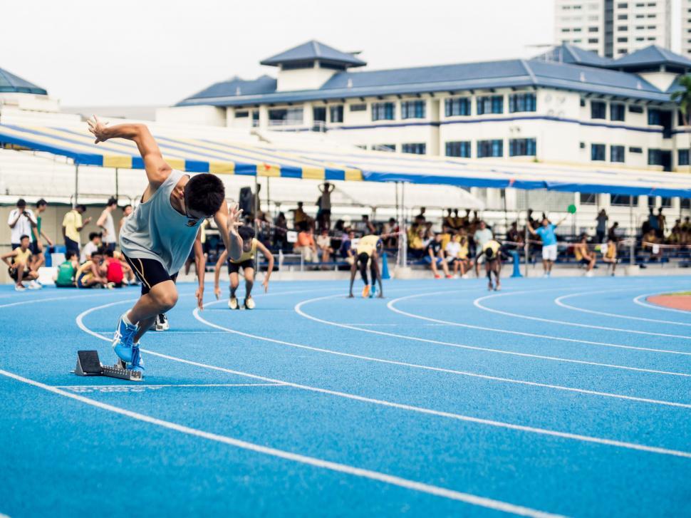 Free Stock Photo of Athlete starting a race on a track | Download Free ...