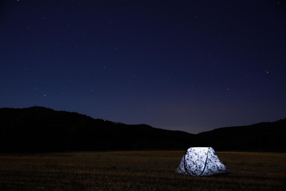 Free Stock Photo of Boulder illuminated under starry night sky ...
