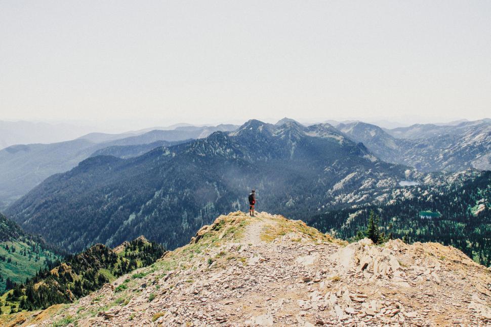 Free Stock Photo of Hiker on a mountain trail with scenic view ...