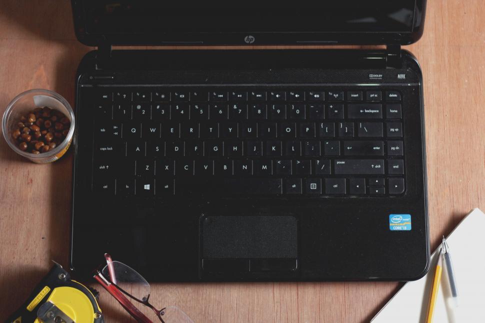 Free Stock Photo of Workstation with laptop and various objects ...