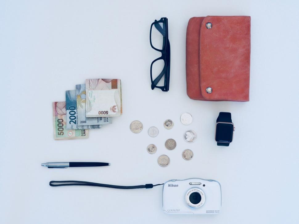 Free Stock Photo of Essentials items on white background travel ...