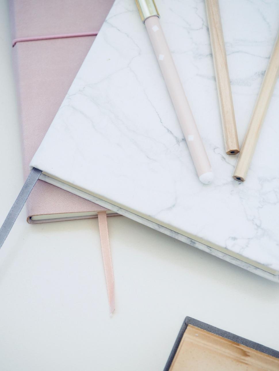 Free Stock Photo of Stylish marble pattern notebook with pencils ...