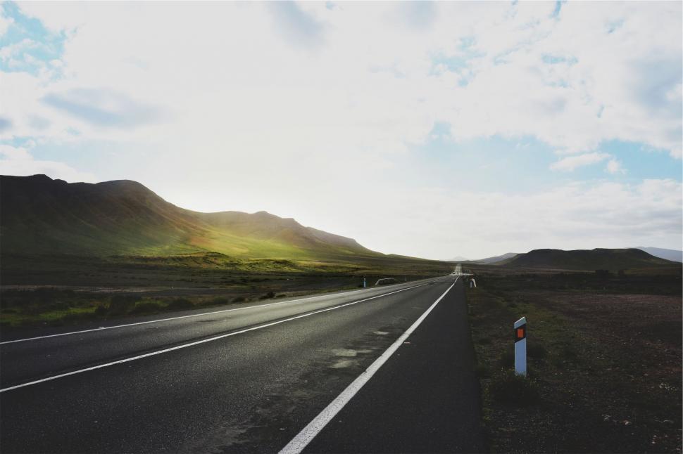 Free Stock Photo of Long road stretching through a scenic landscape ...