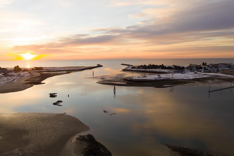 Free Stock Photo of Sunset over calm waters with land and reflections ...