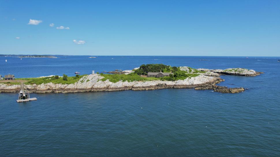 Free Stock Photo of Aerial view of an isolated small island in clear ...