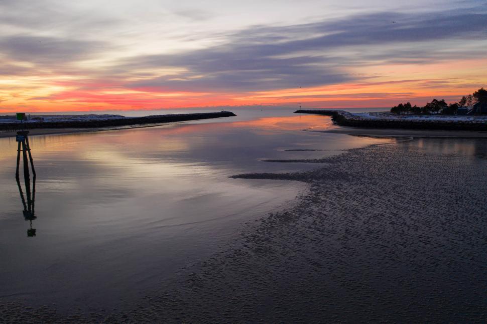 Free Stock Photo of Calm inlet opening to ocean during a vibrant ...