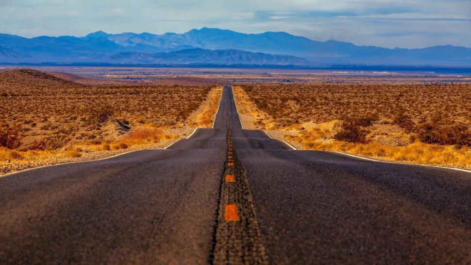 Free Stock Photo of Long straight road through desert to distant ...