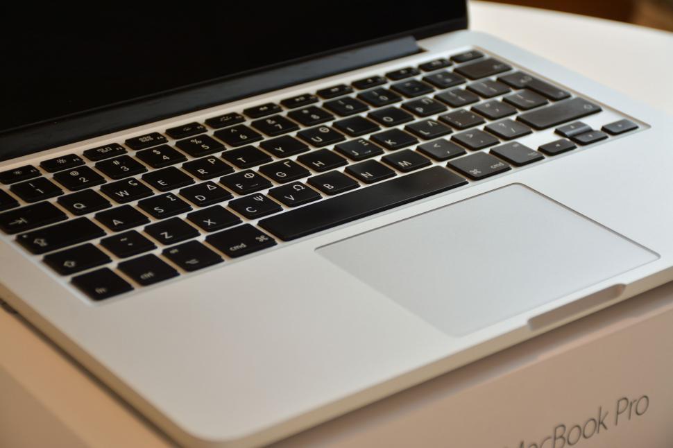 Free Stock Photo of MacBook Pro keyboard with a focus on sleek design ...